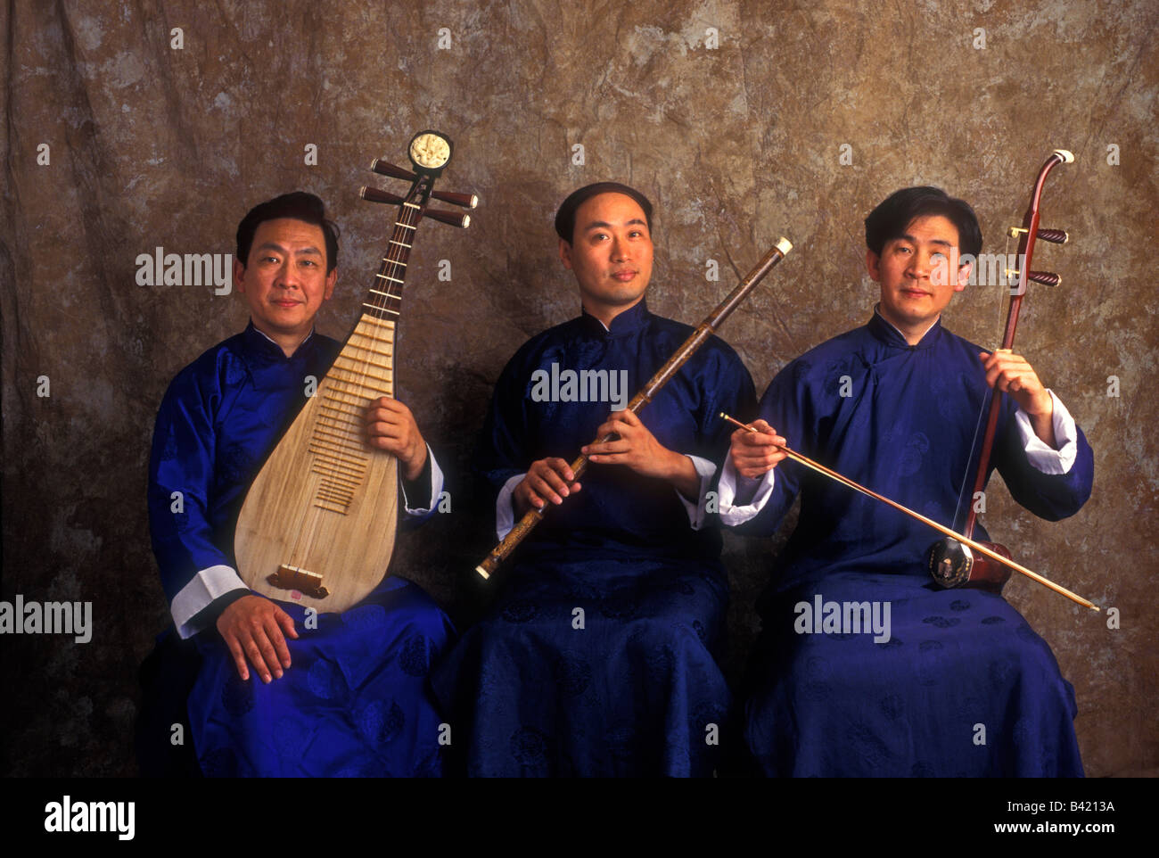 Trio of Chinese musicians Stock Photo - Alamy