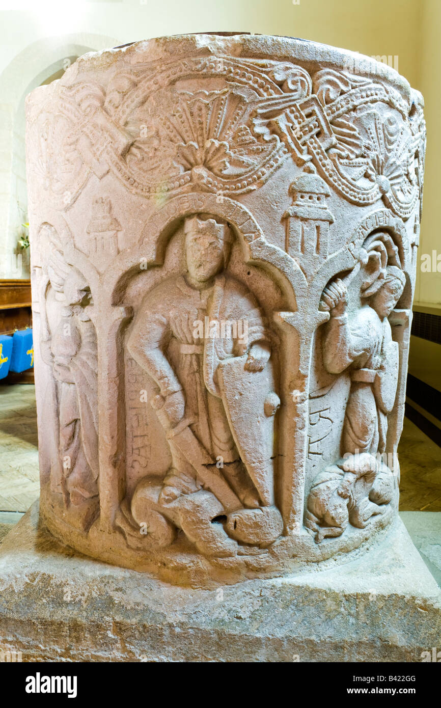 The wonderfully carved Norman font in St Peters church in the Cotswold ...