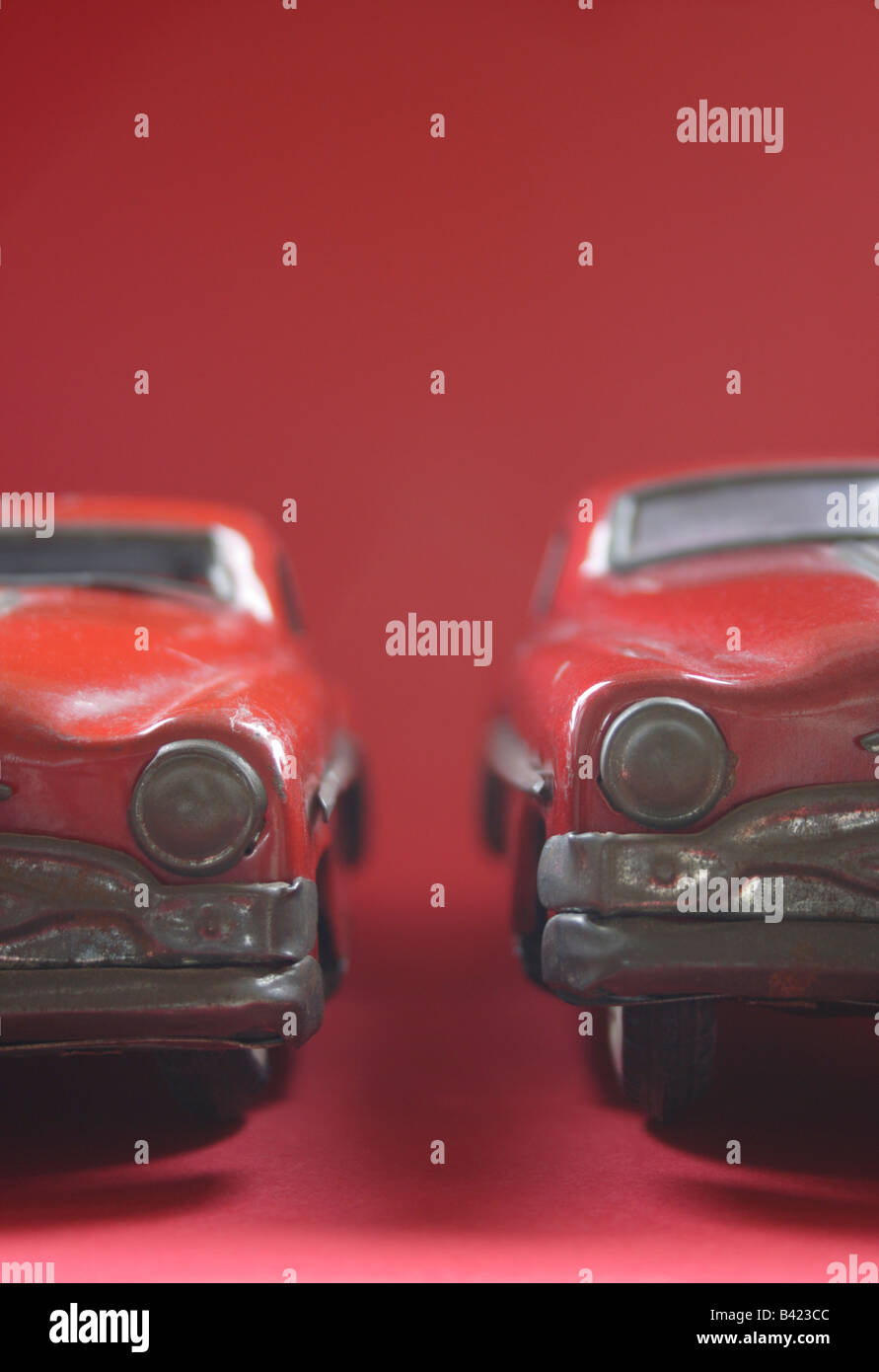 two similar red cars Stock Photo - Alamy