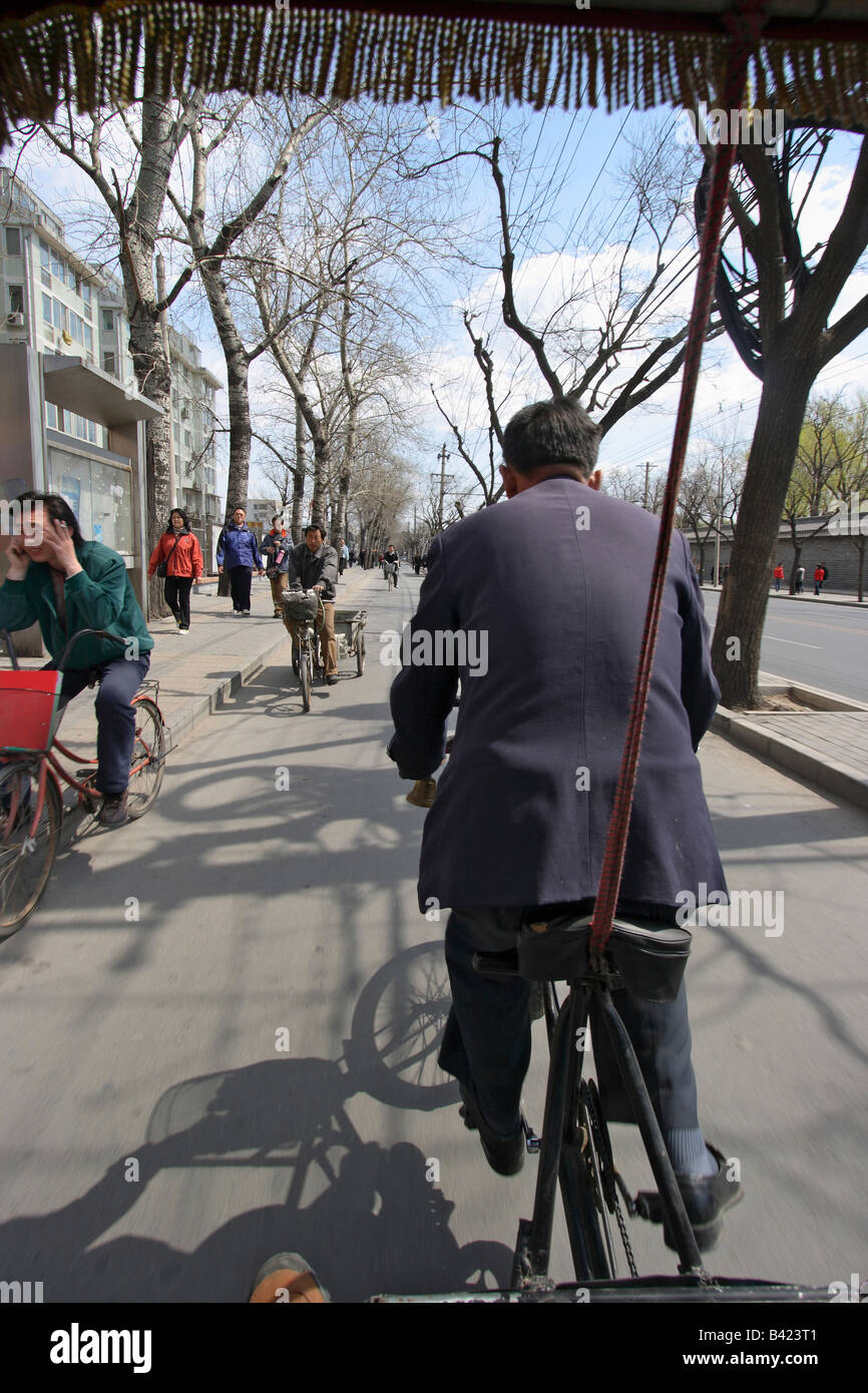 Back of a rickshaw driver, Beijing, China Stock Photo - Alamy