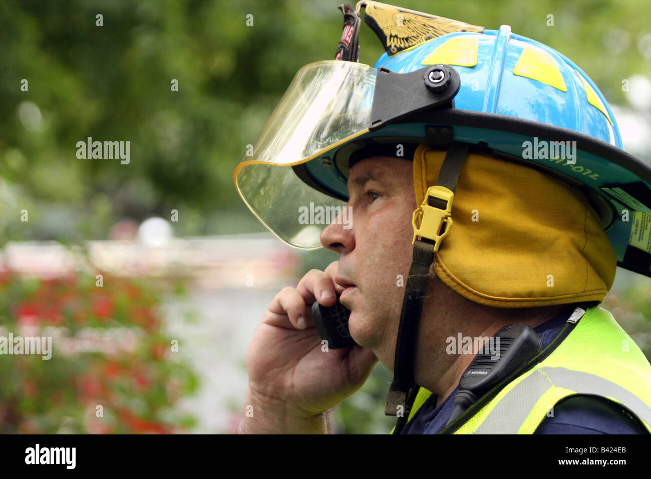 An EMT on a cell phone Stock Photo - Alamy