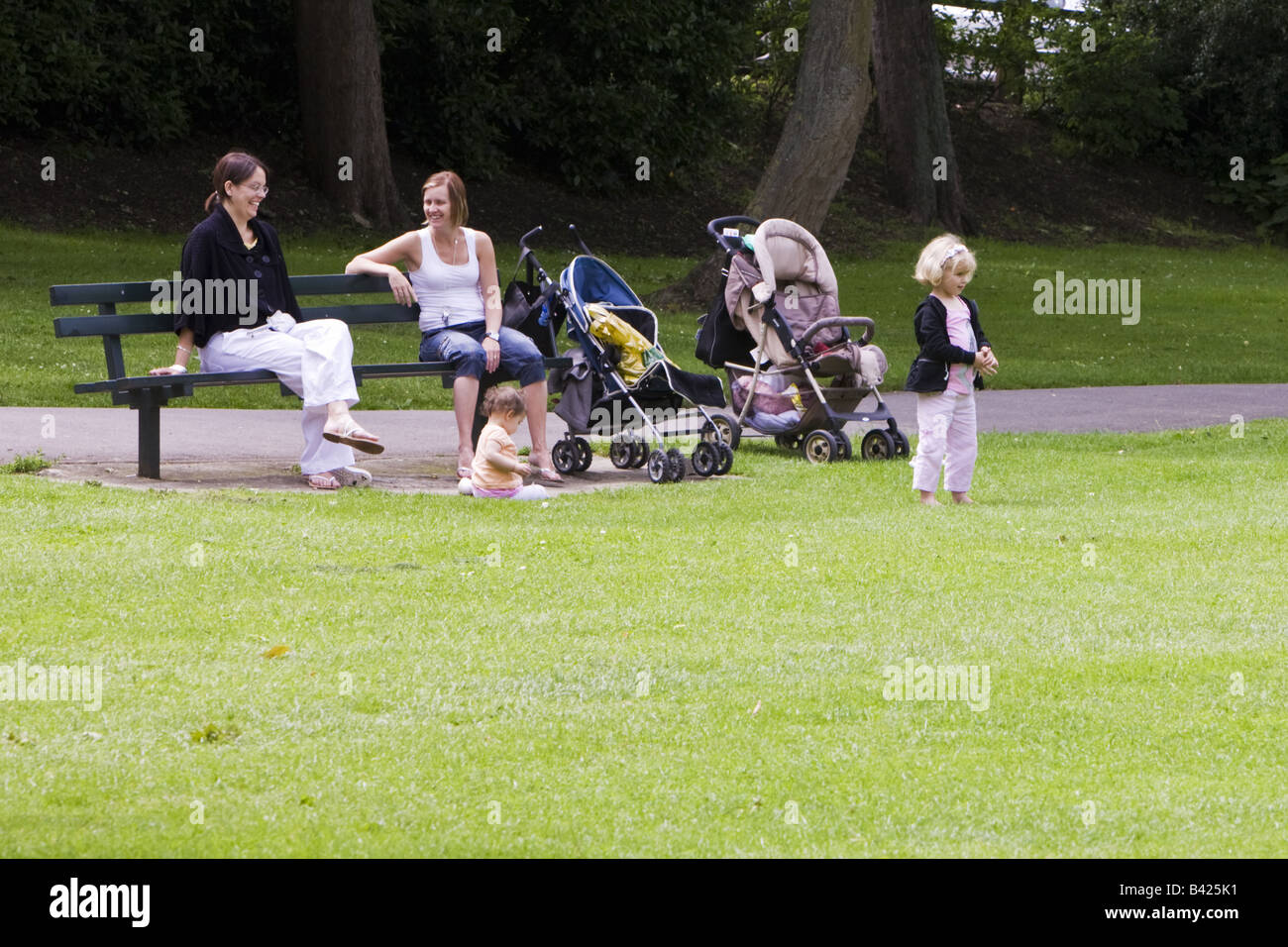 Mums Laughing - Children Play - Push Chairs In The Park At Windsor ...
