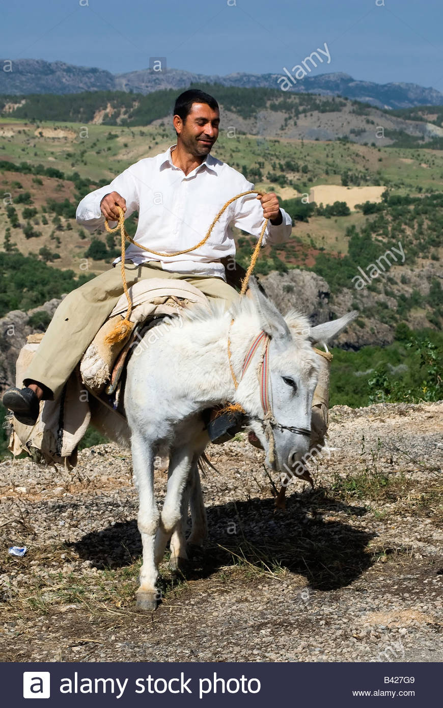 Farmer Riding Donkey High Resolution Stock Photography and Images - Alamy