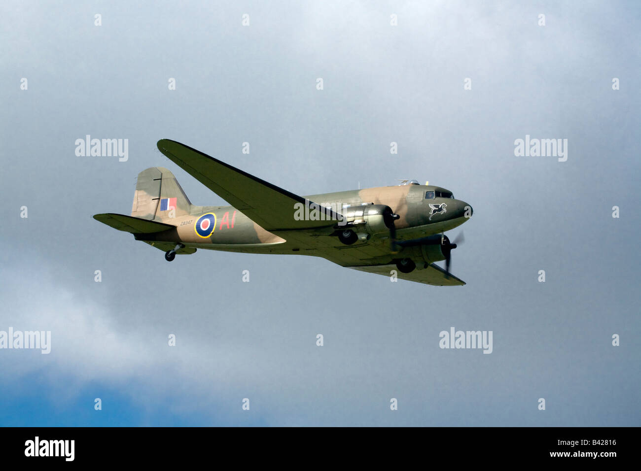 WWII RAF Douglas Dakota (Skytrain) flies over the battle re-enactment ...