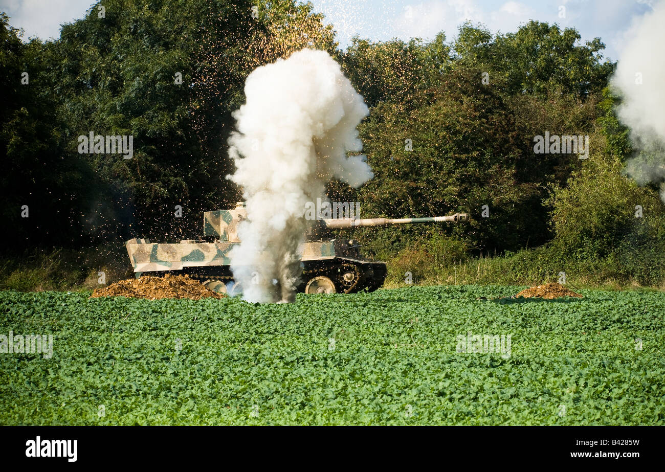 German WWII Tiger Tank crosses a field of in a battle re-enactment at ...