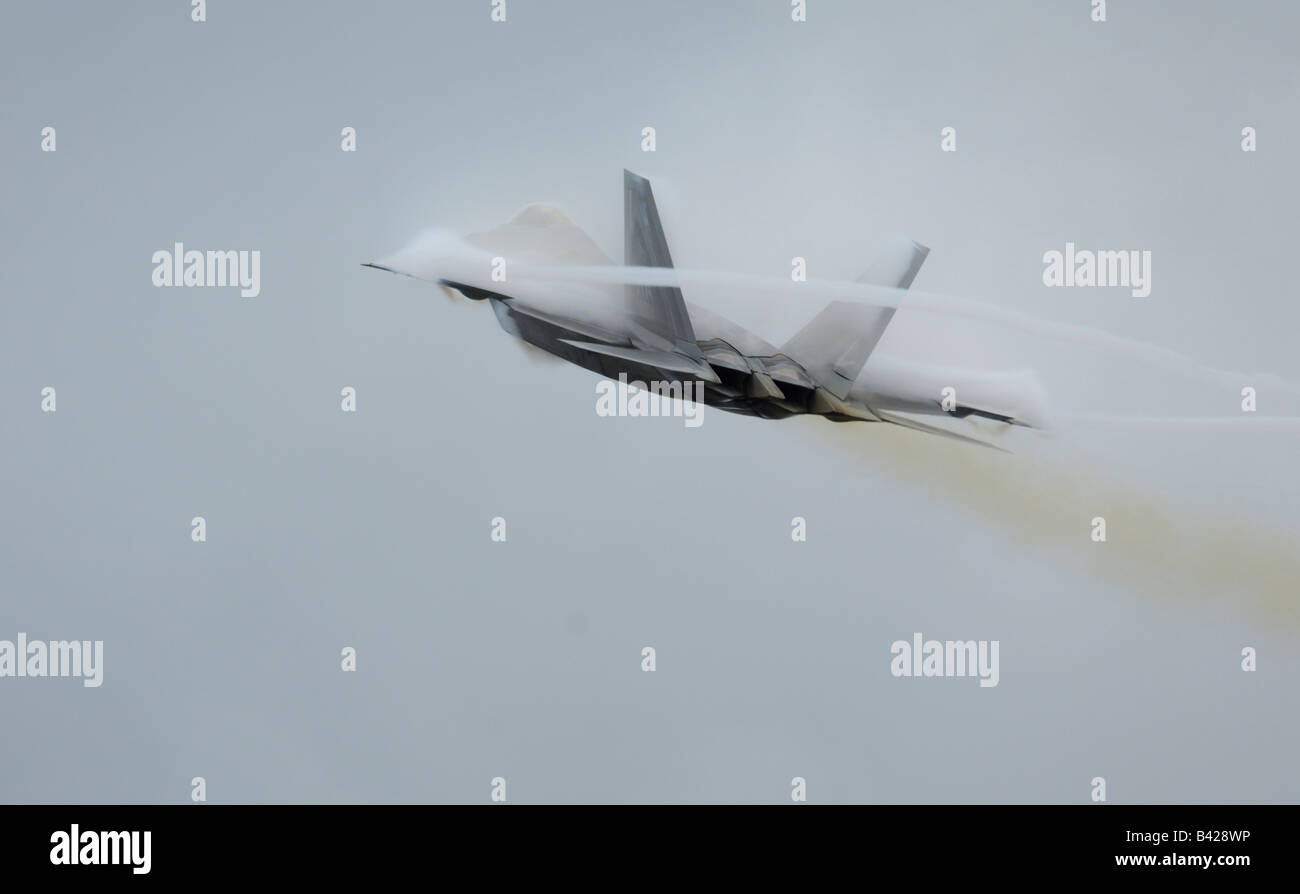 Modern & stealth american jet fighter F-22A Raptor climbing at high ...