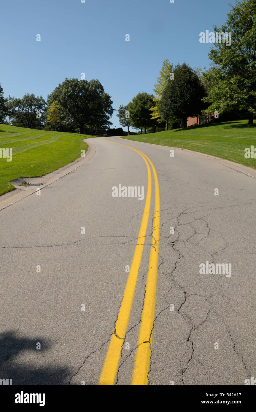 Converging rural road Stock Photo - Alamy