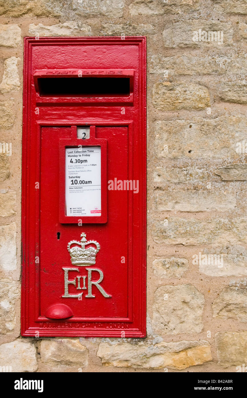 Classic red letter box set in Cotswold stone Stock Photo - Alamy