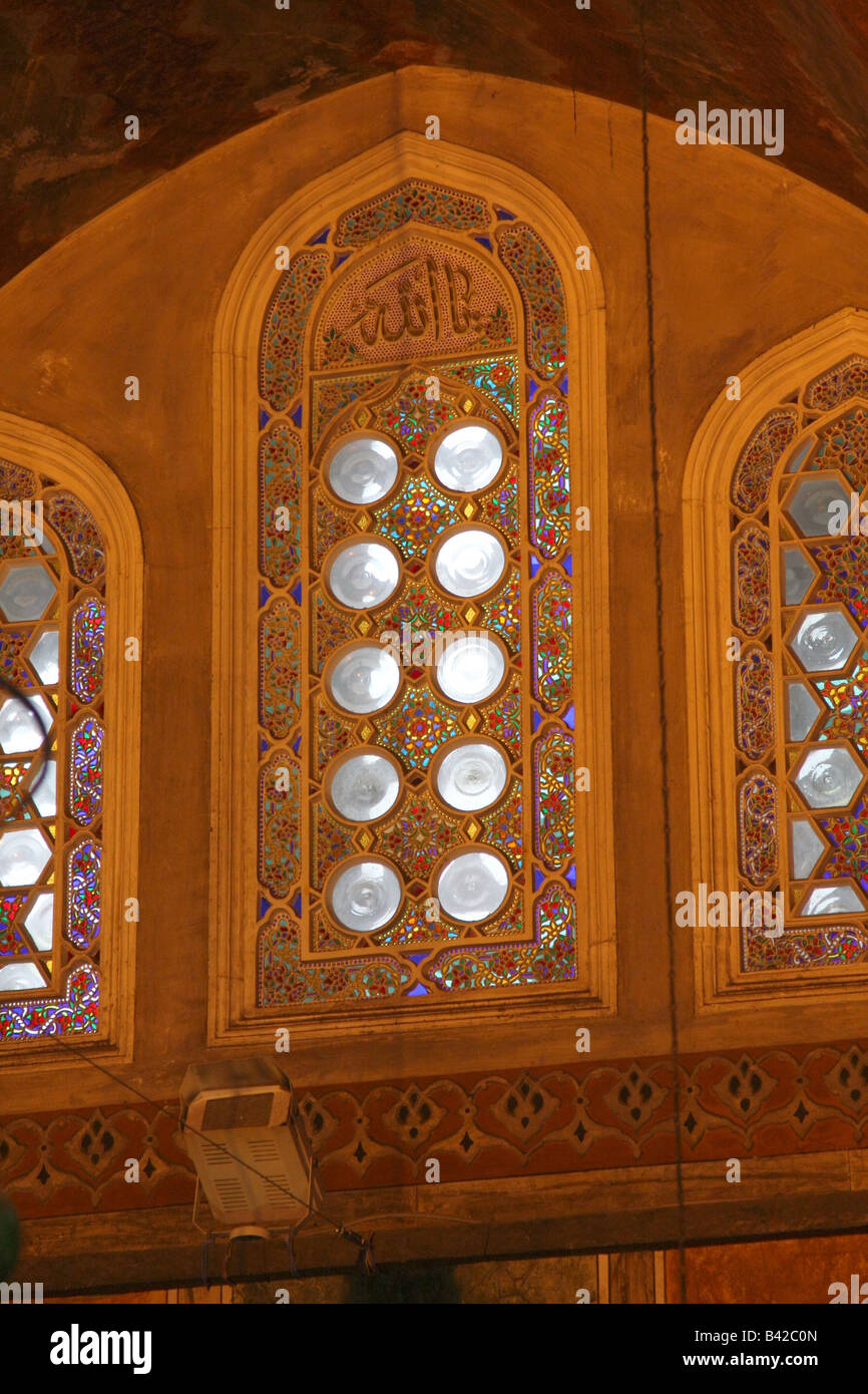 Hand crafted colorful tomb windows Stock Photo - Alamy