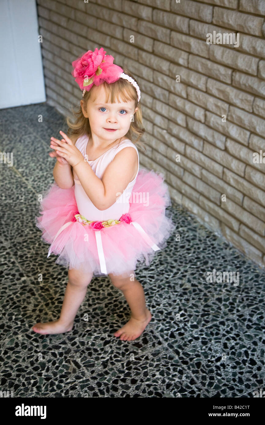 Little girl dressed in a frilly pink tutu Stock Photo - Alamy
