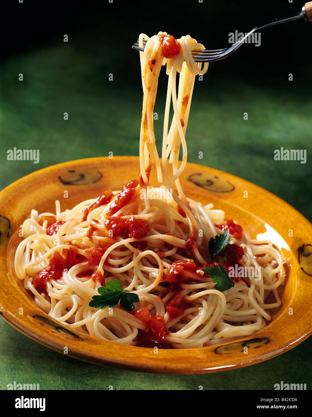 Fork and spaghetti editorial food Stock Photo - Alamy