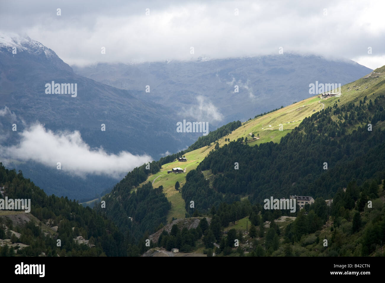 A landscape view of mountains, with light and shadows Stock Photo - Alamy