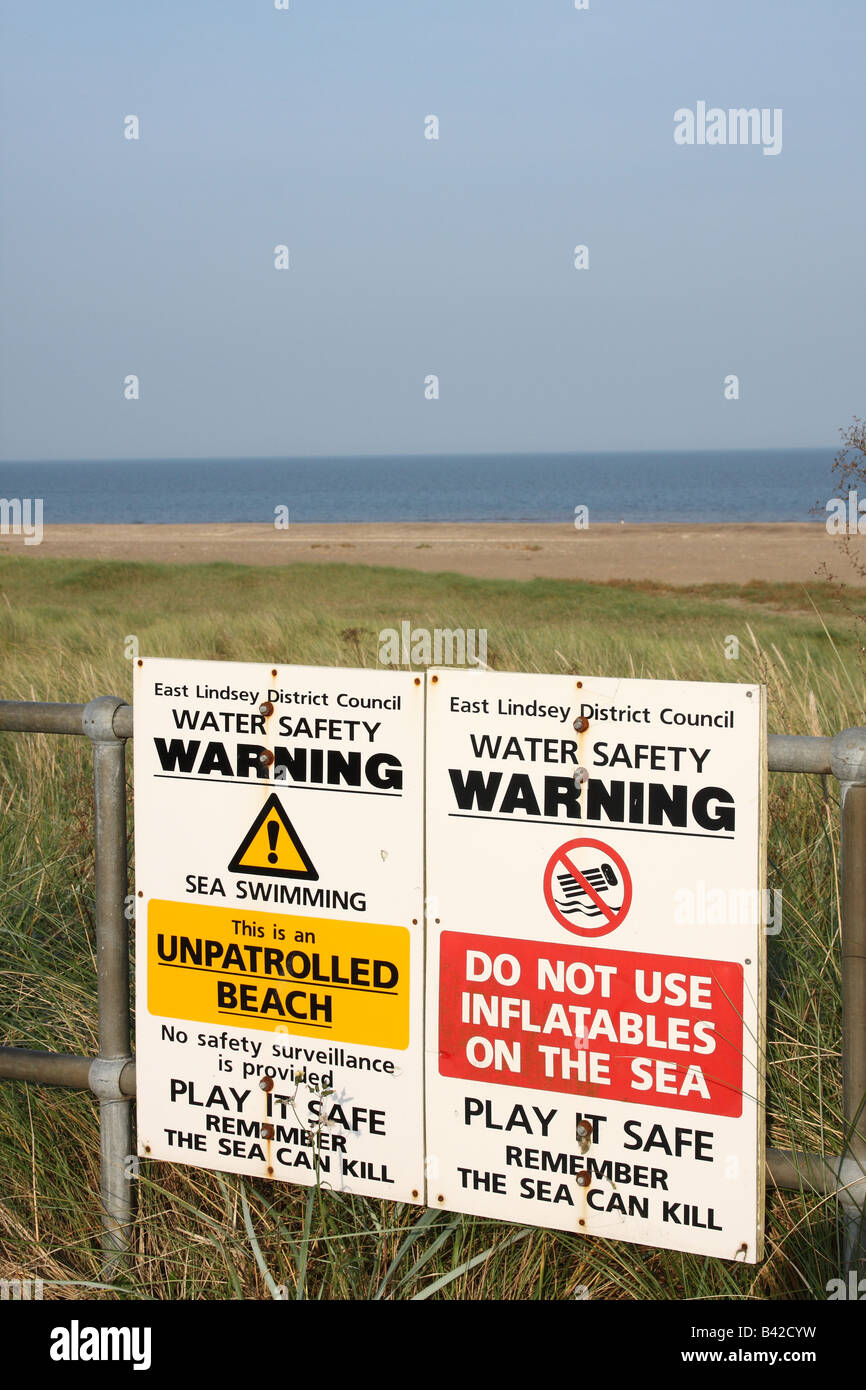 Safety warning signs on a beach in Lincolnshire, England, U.K Stock ...