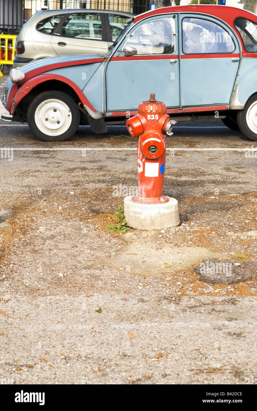 detail of french fire hydrant and red and blue Citroën 2CV car Stock ...