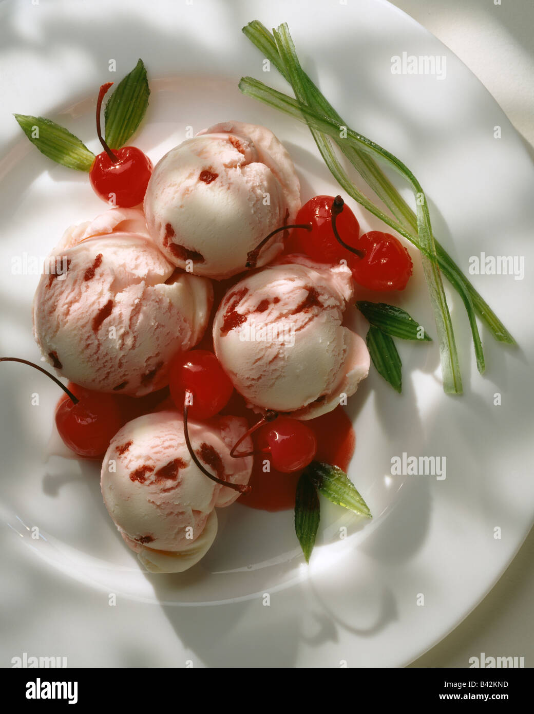 Plate of cherry ice cream Stock Photo - Alamy