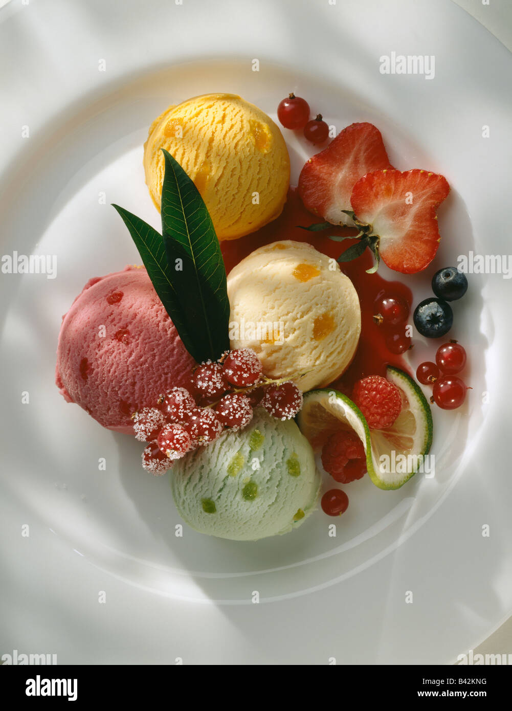 Raspberry coulis ice cream hi-res stock photography and images - Alamy
