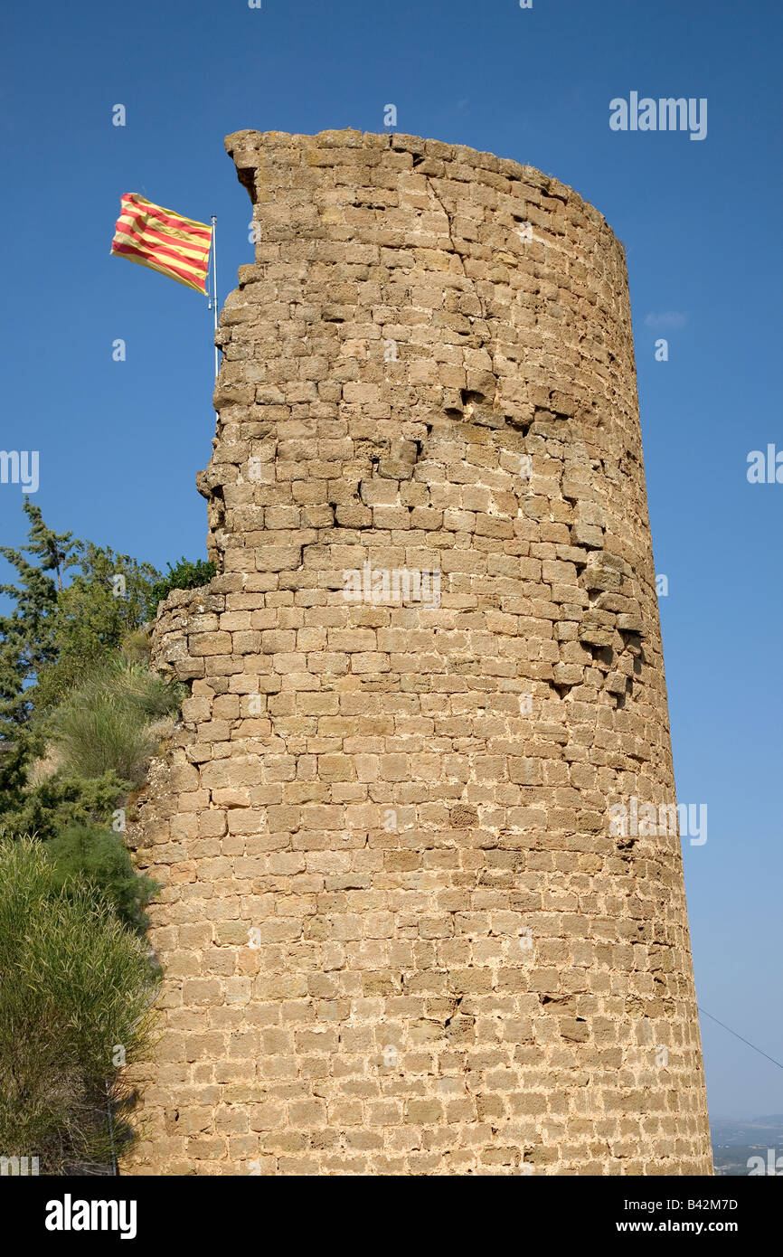 Historic castle flying Spanish flag near village of Solsona, Cataluna ...