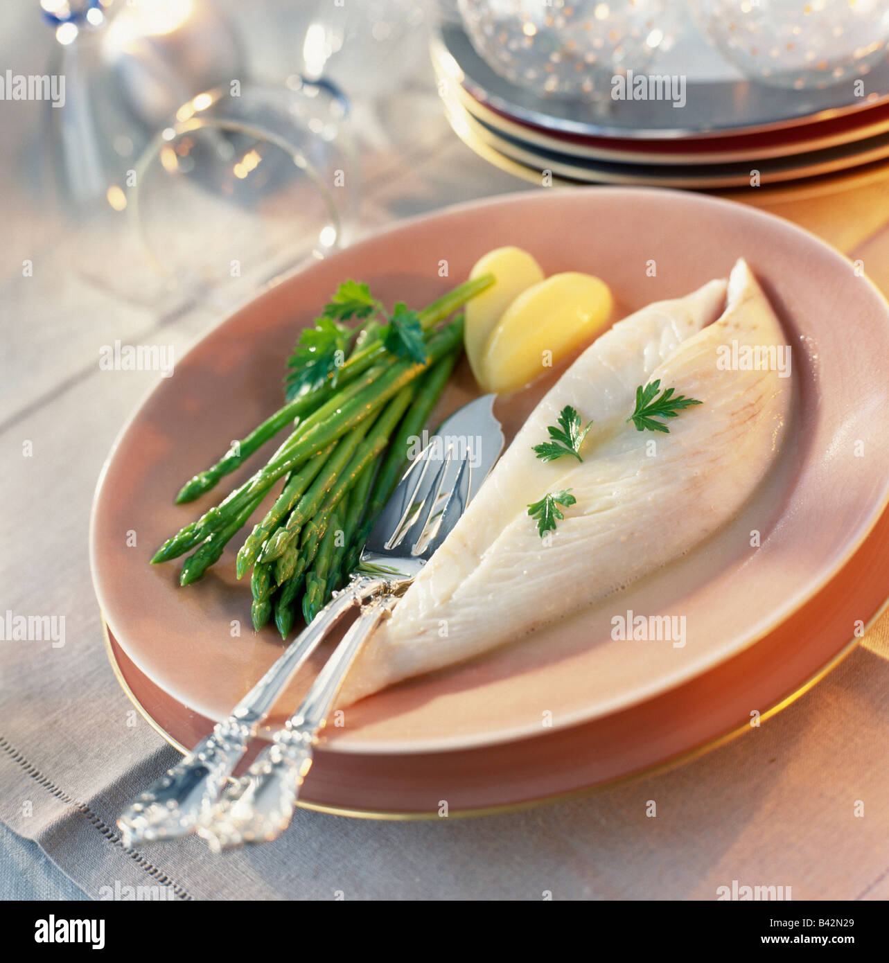 John Dory fillets with green asparagus Stock Photo - Alamy