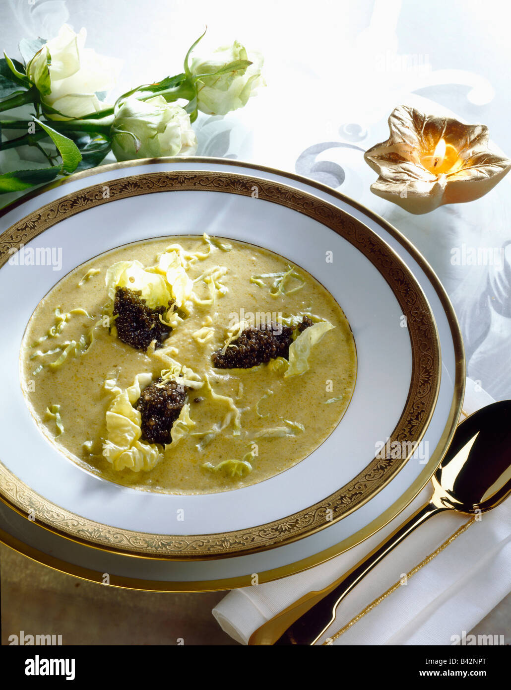 Cream of lettuce with caviar Stock Photo - Alamy