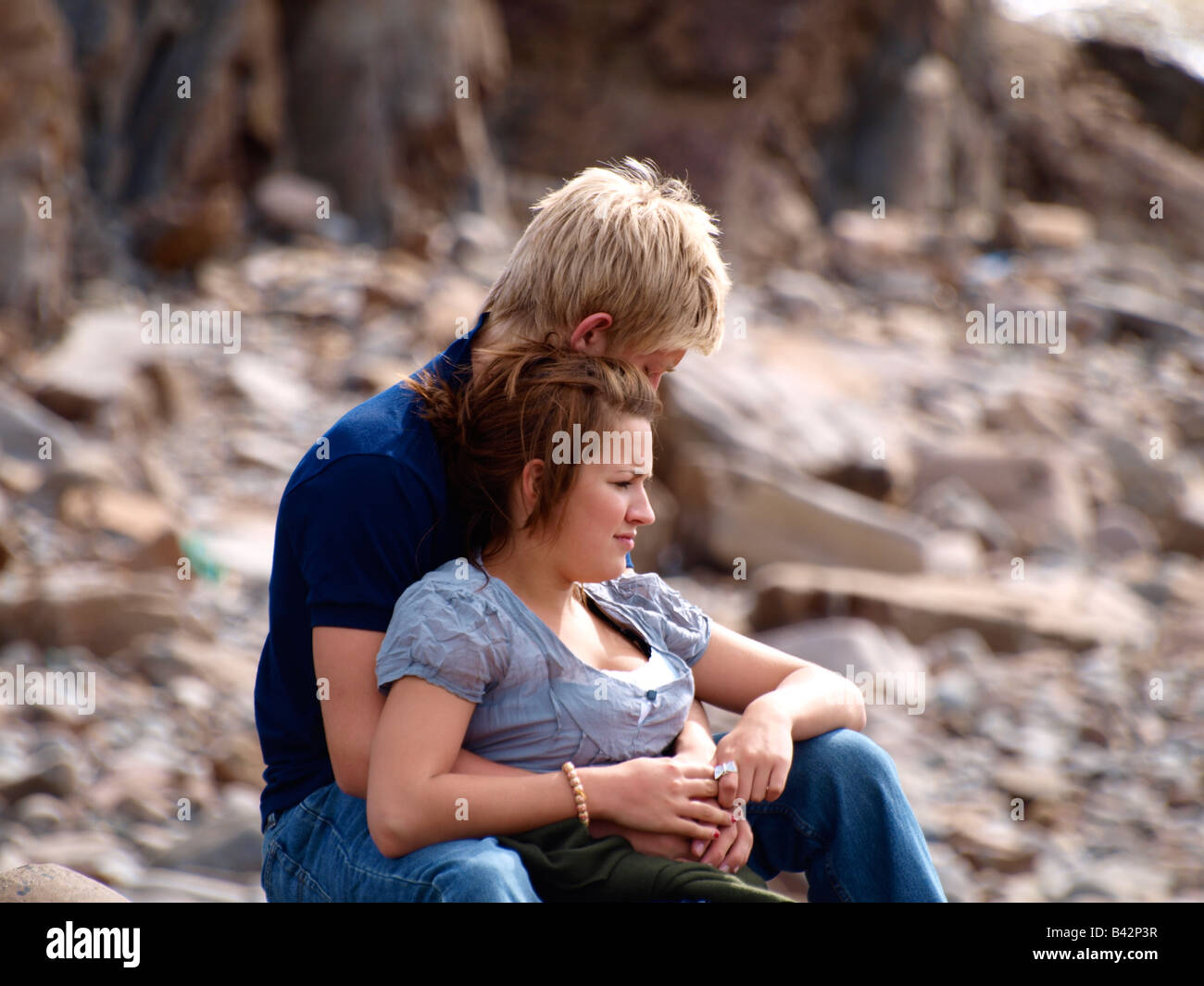 Young couple cuddling cuddling Stock Photo - Alamy