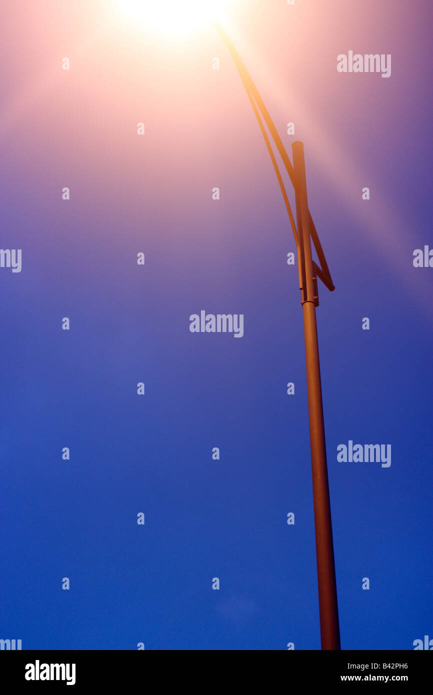 A street light shining at dusk Stock Photo - Alamy