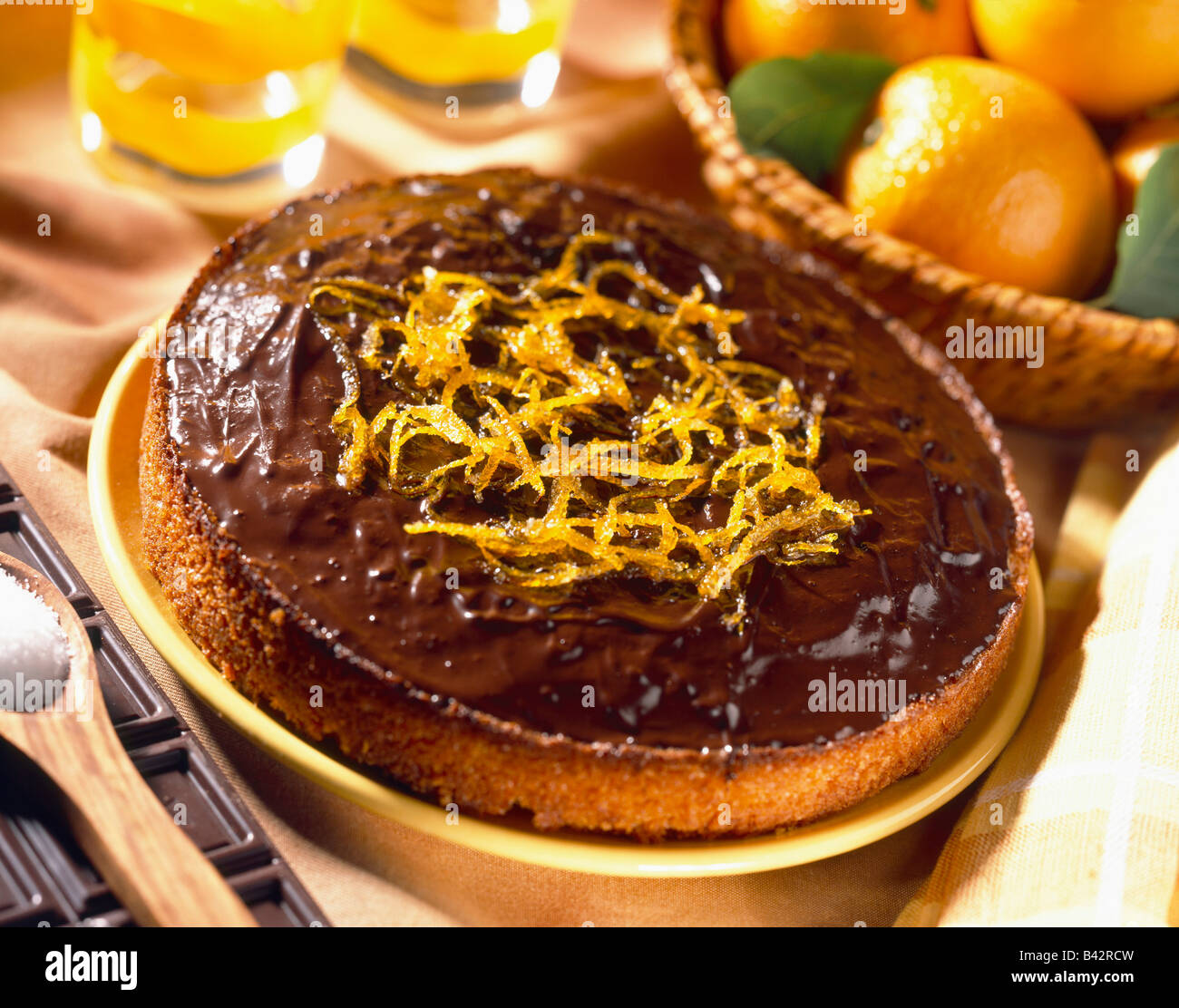 Orange sponge cake with chocolate icing Stock Photo - Alamy