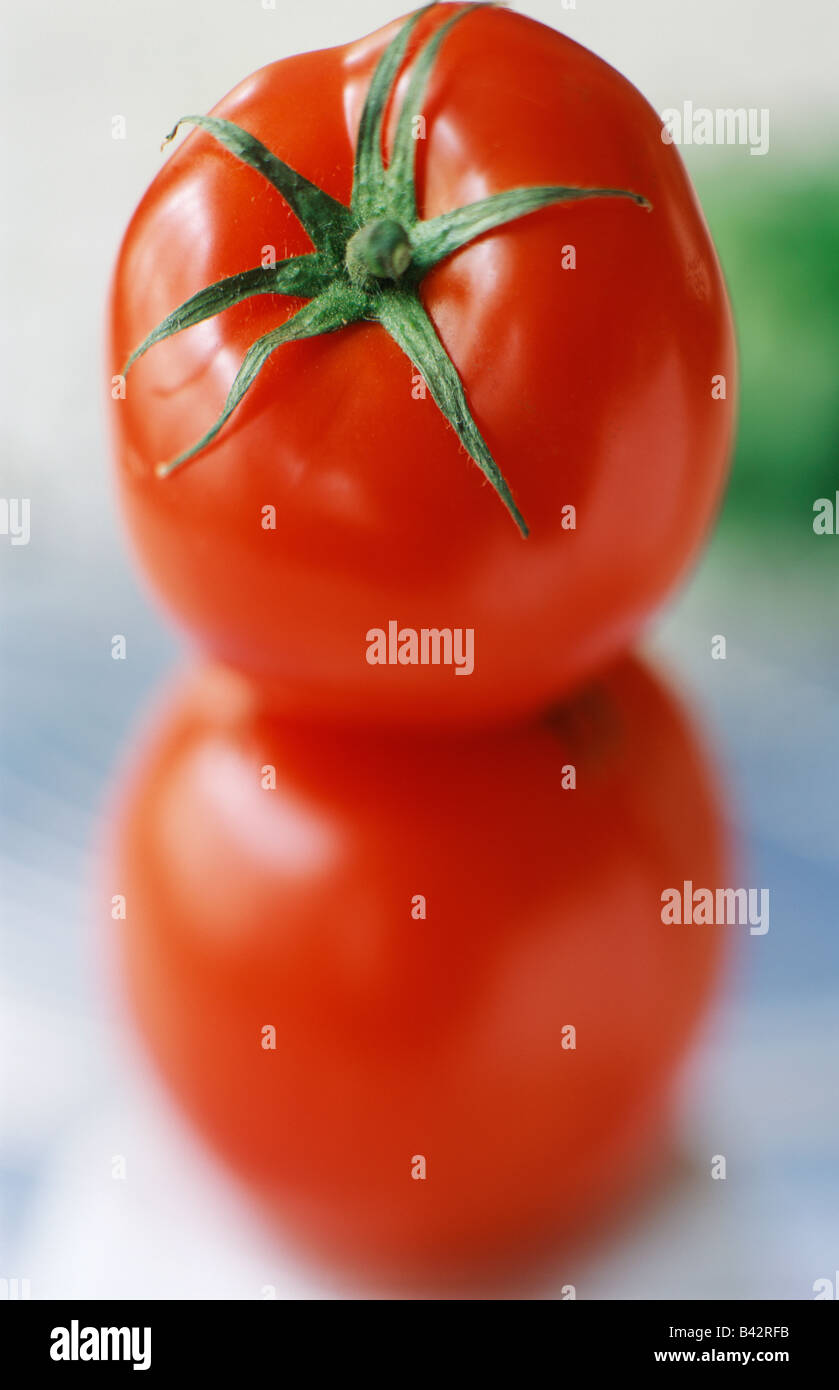 two stacked tomatoes Stock Photo - Alamy