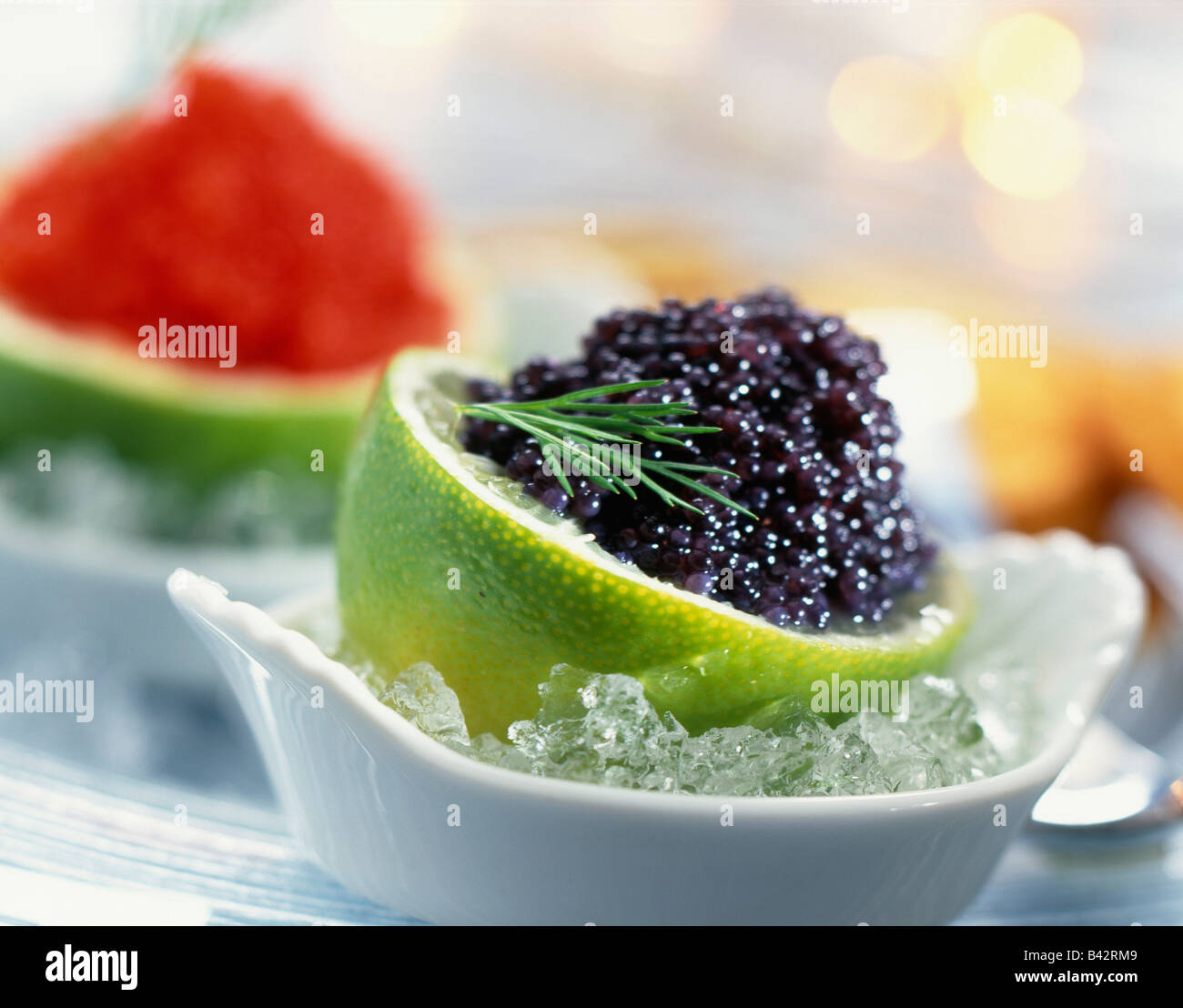 Lime filled with lumpfish roe Stock Photo - Alamy