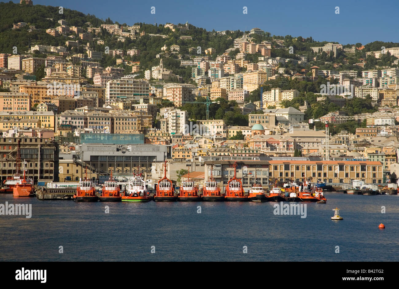 Red tug boats lining Genoa Harbor, Genoa, Italy, Europe Stock Photo - Alamy