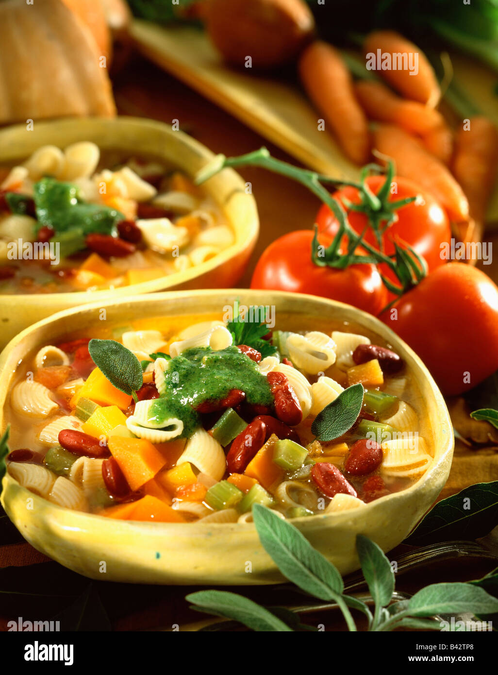 Minestrone with pesto and dried fruits Stock Photo - Alamy