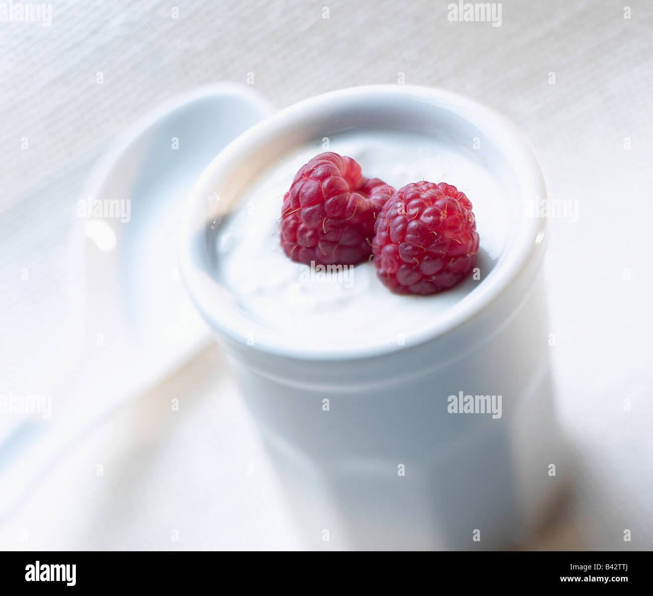 fromage frais with raspberries Stock Photo - Alamy