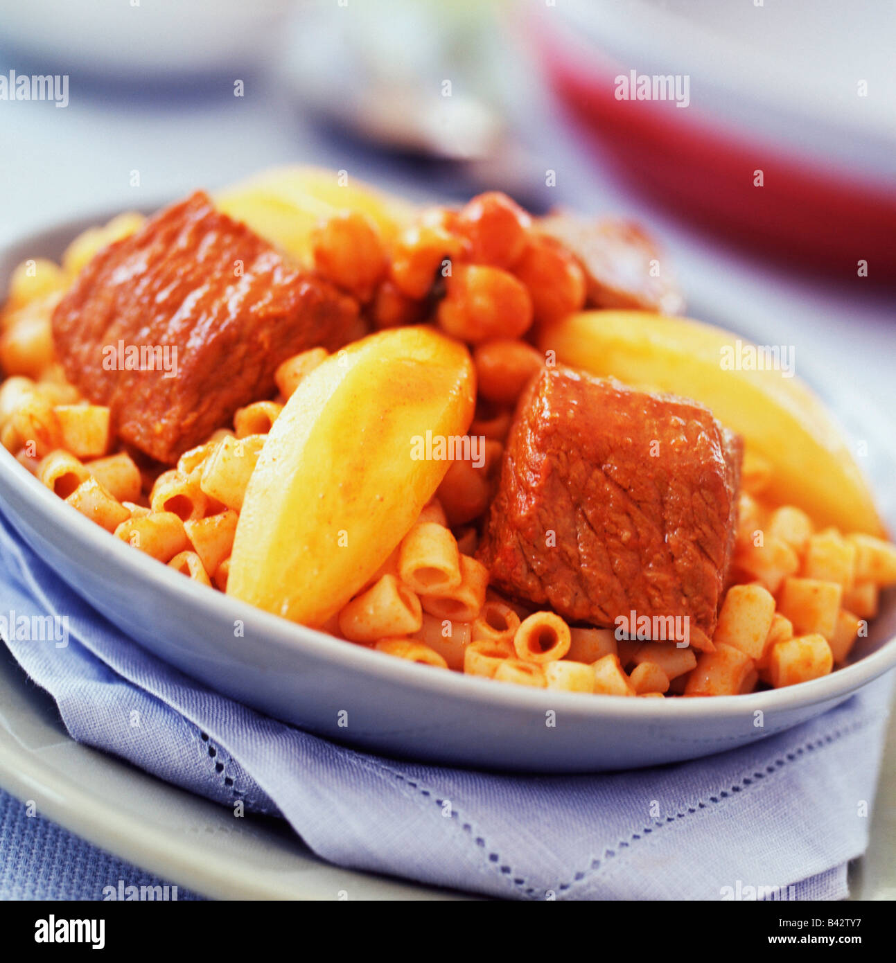 sauteed lamb with tomato Stock Photo - Alamy