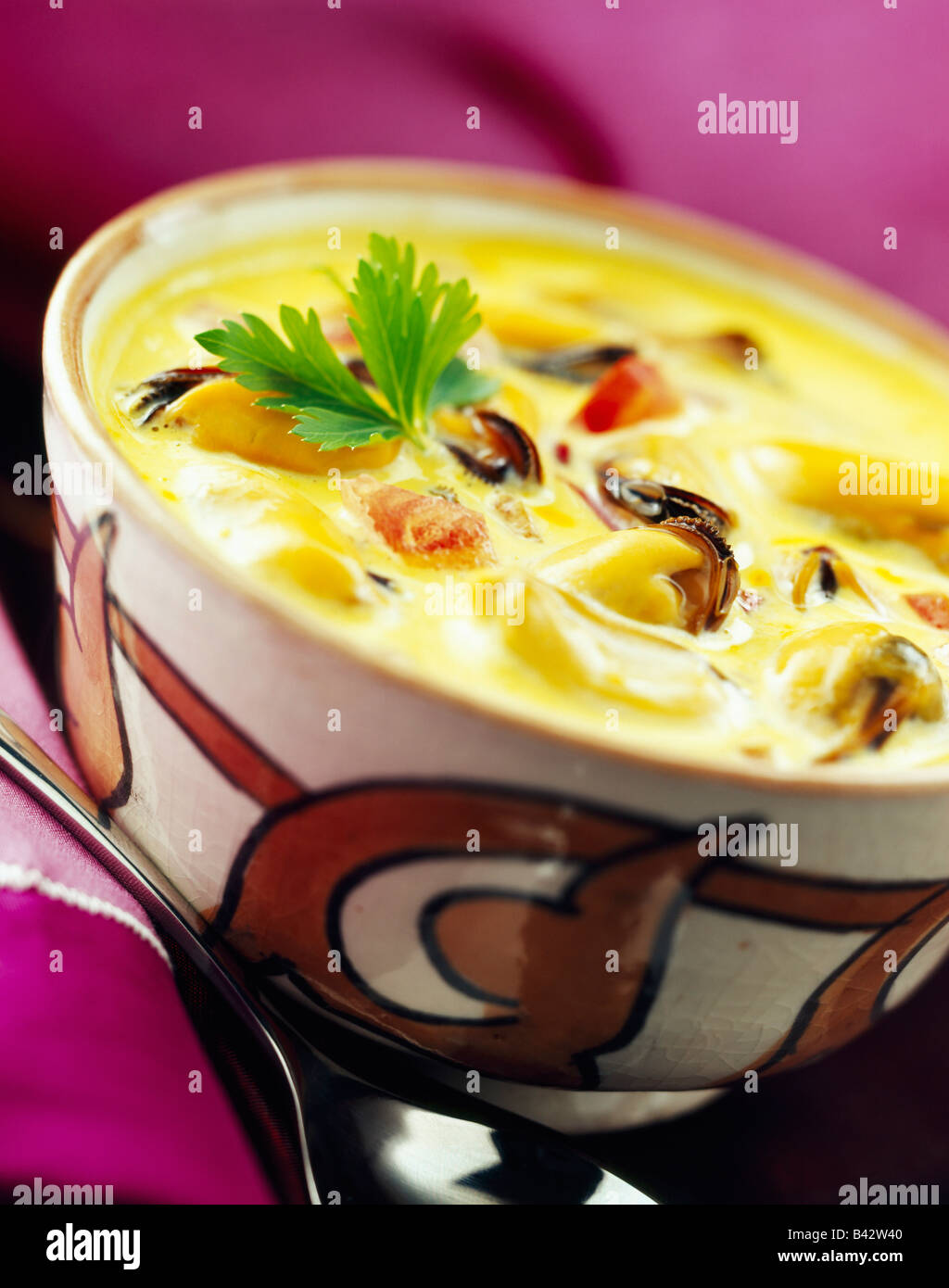 saffron mussel soup Stock Photo - Alamy