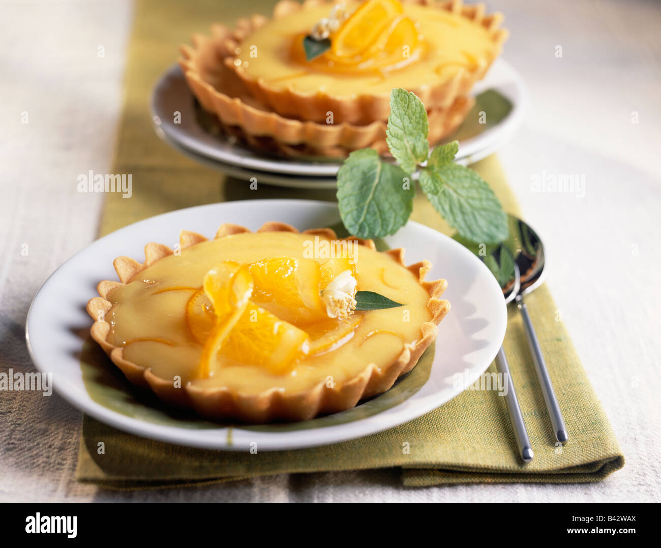 individual orange tarts Stock Photo - Alamy
