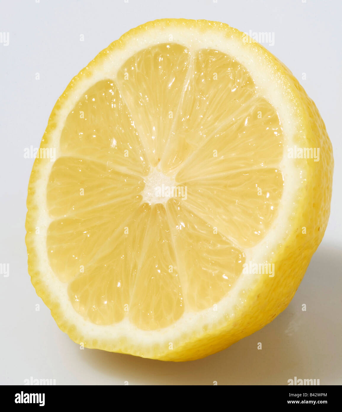 lemon cut in half Stock Photo - Alamy