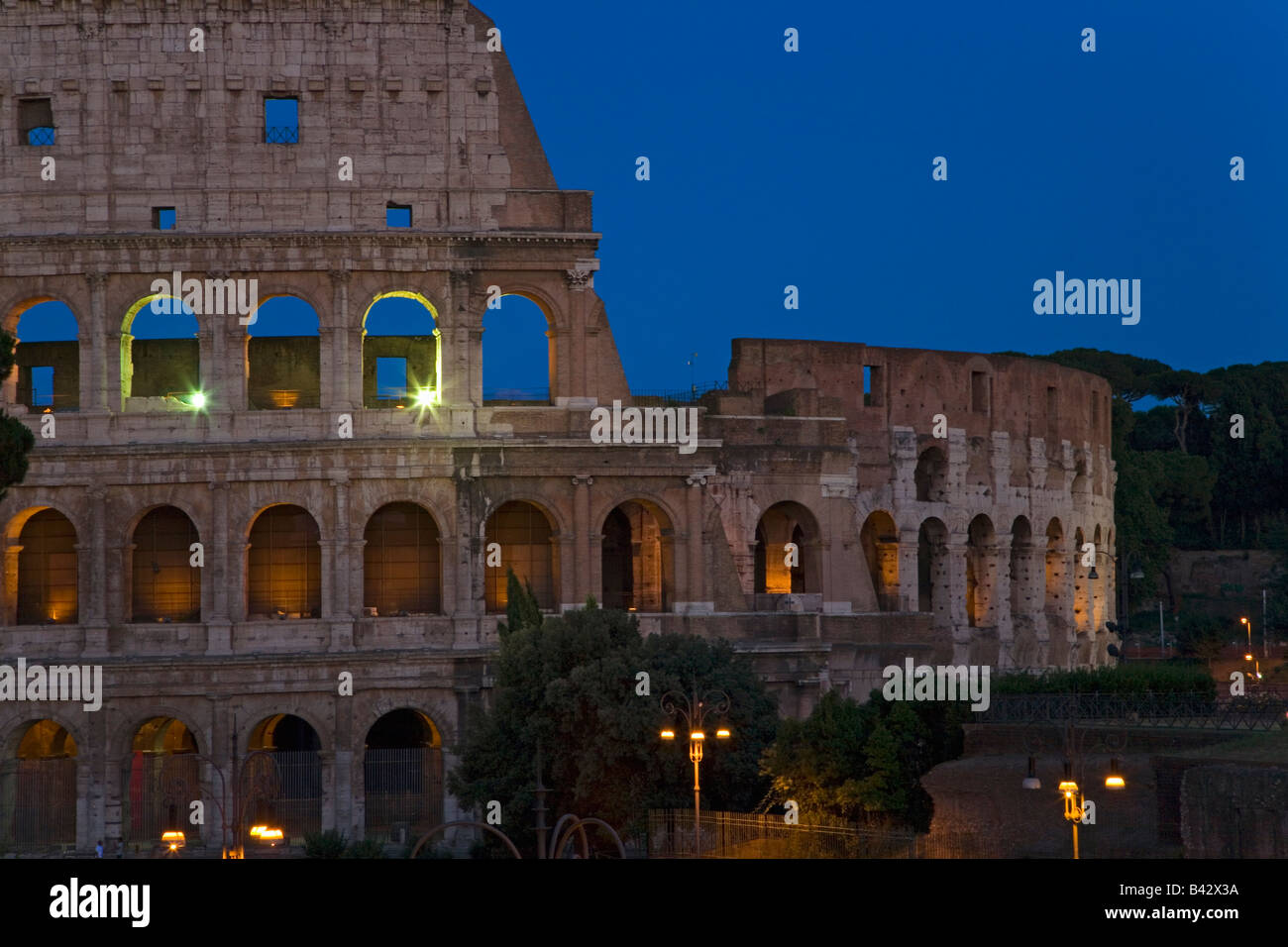 The Colosseum or Roman Coliseum at dusk, originally the Flavian ...
