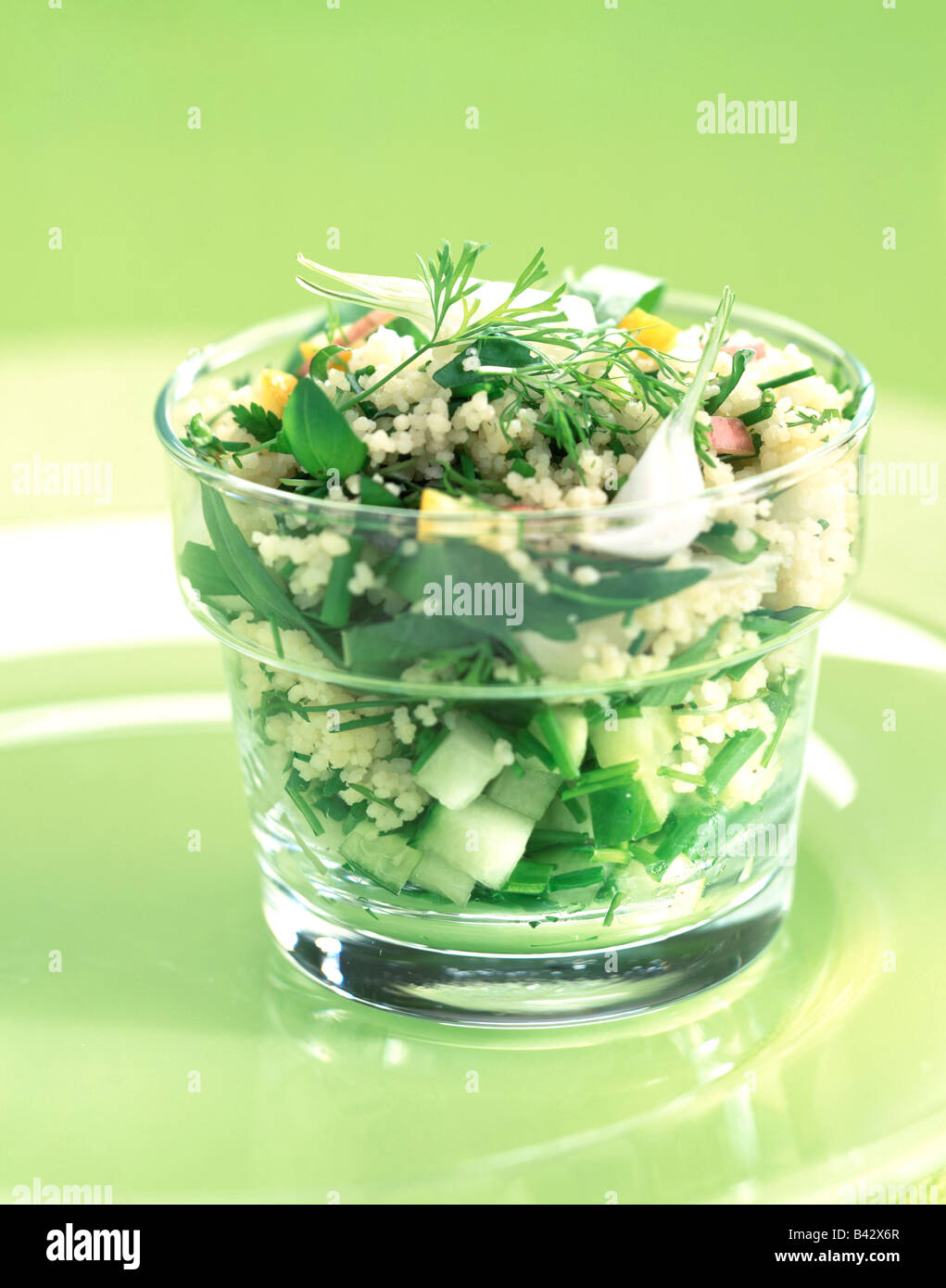 taboule-style, couscous semolina with herbs Stock Photo - Alamy