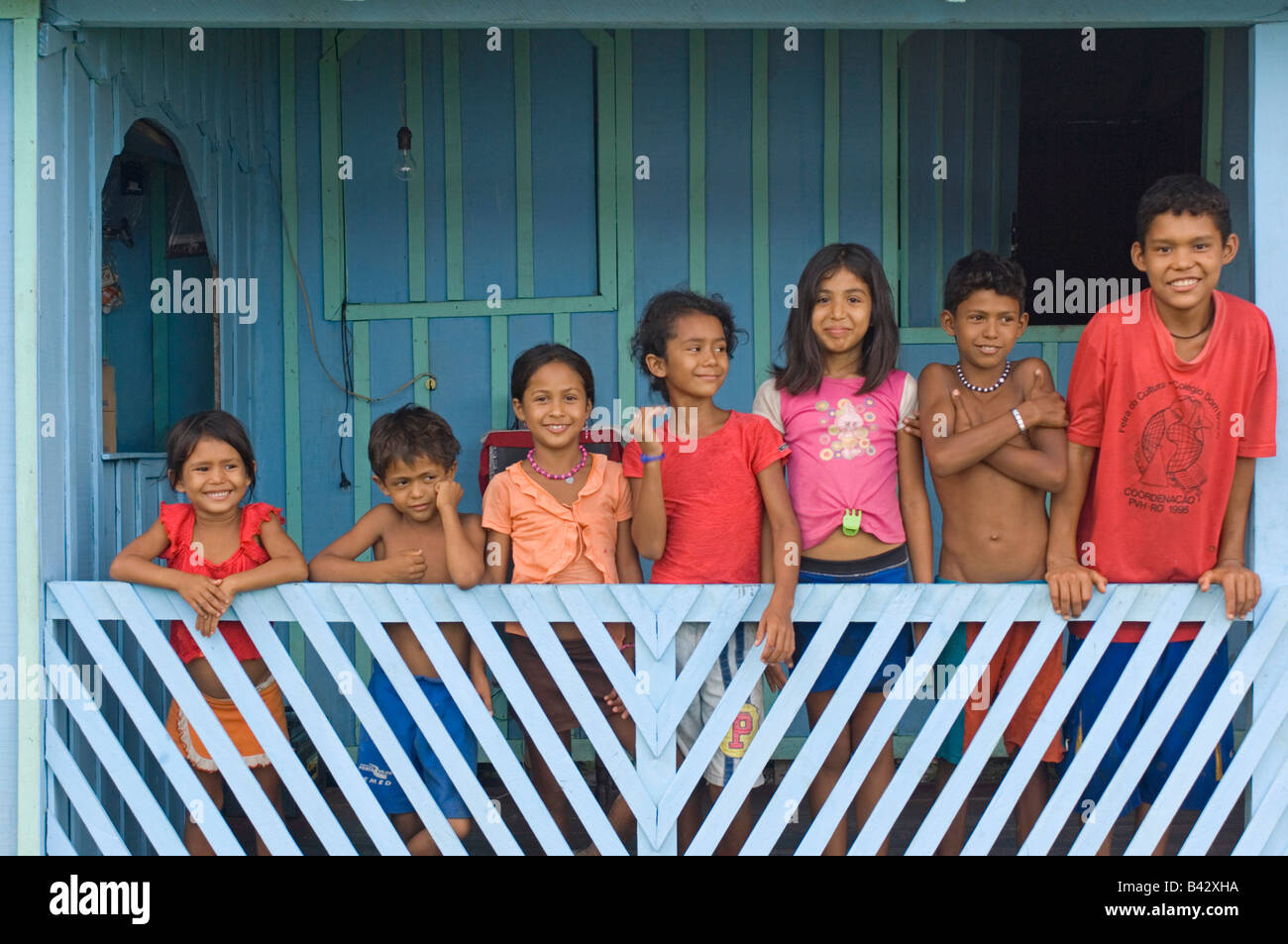 A portrait of a group of 7 Brazilian children in a small village by the ...