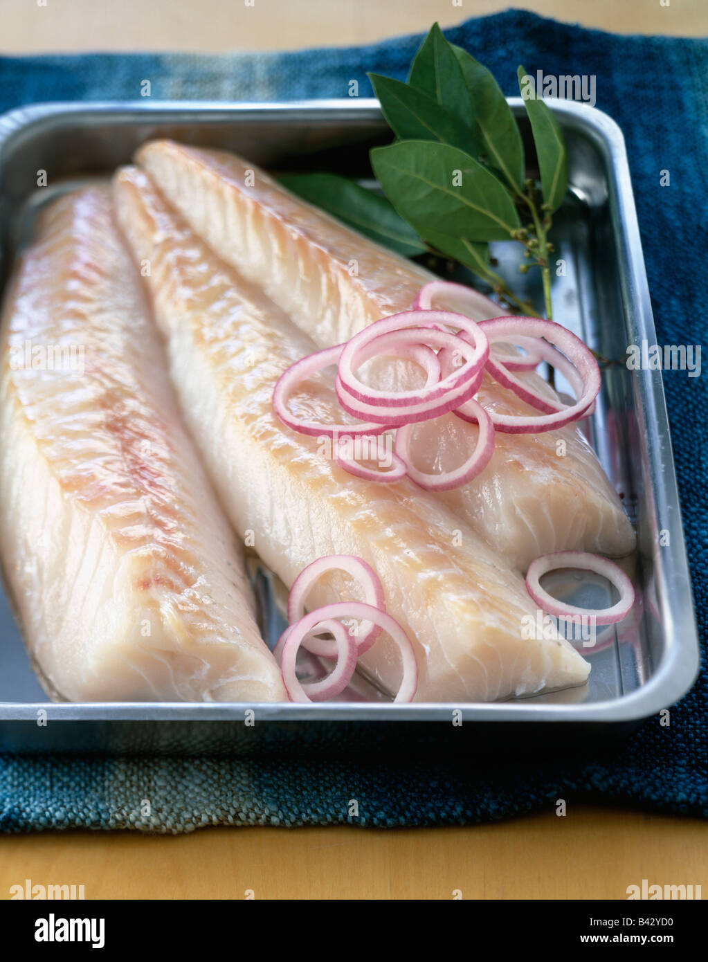 Raw cod fillets Stock Photo - Alamy