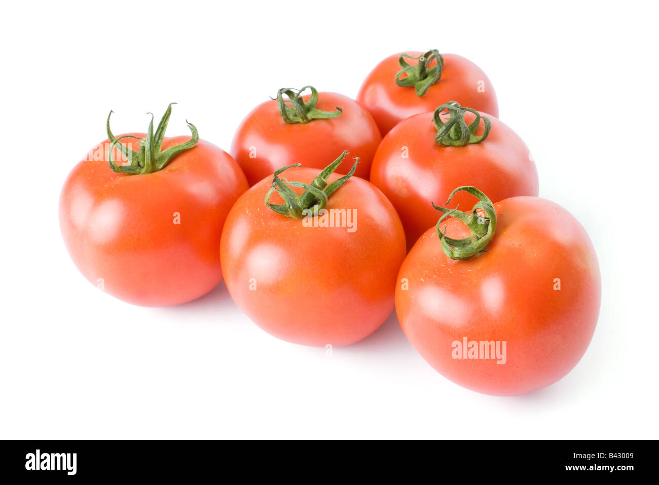 Ripe tomatoes isolated on a white background Stock Photo - Alamy