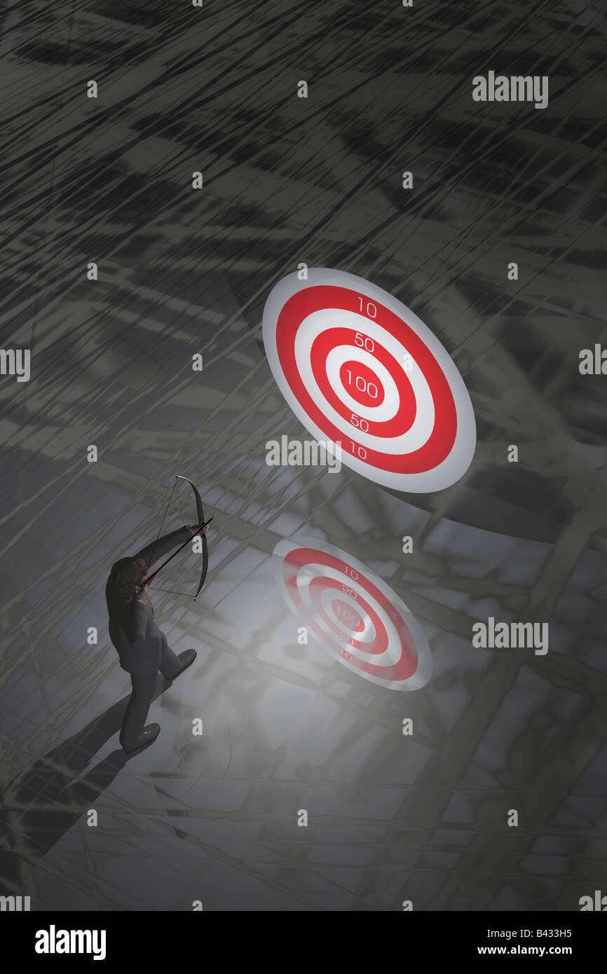 Businessman aiming at a target Stock Photo - Alamy