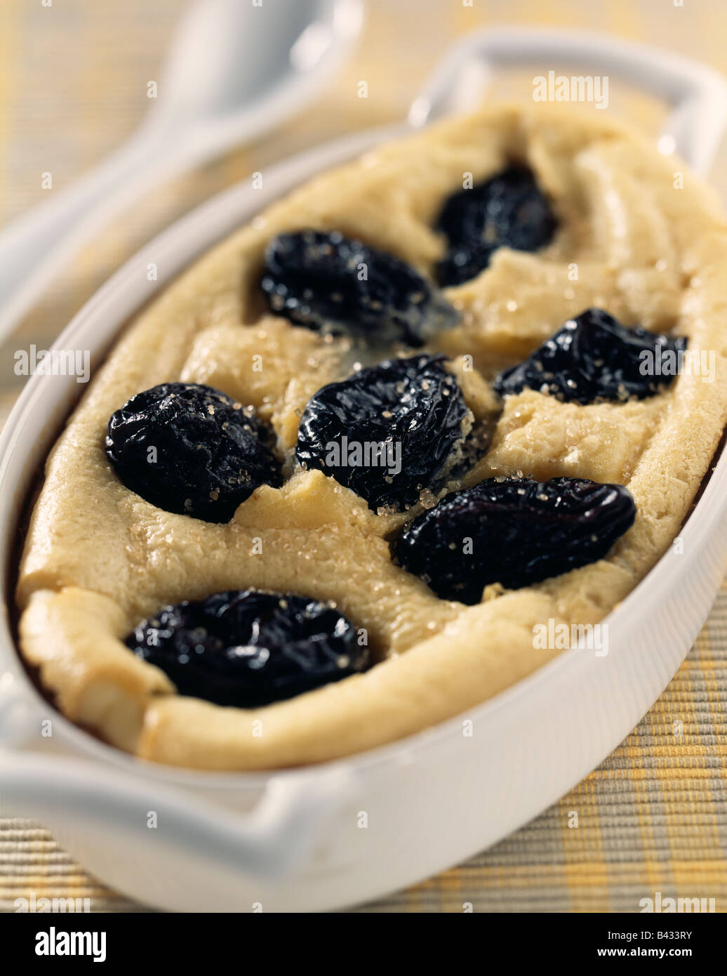 prune clafoutis batter pudding Stock Photo - Alamy