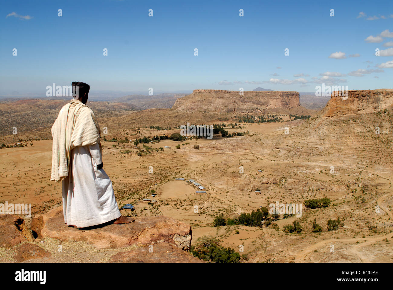 Orthodox Monk standing on the rock of the monastery of Debra Demo ...