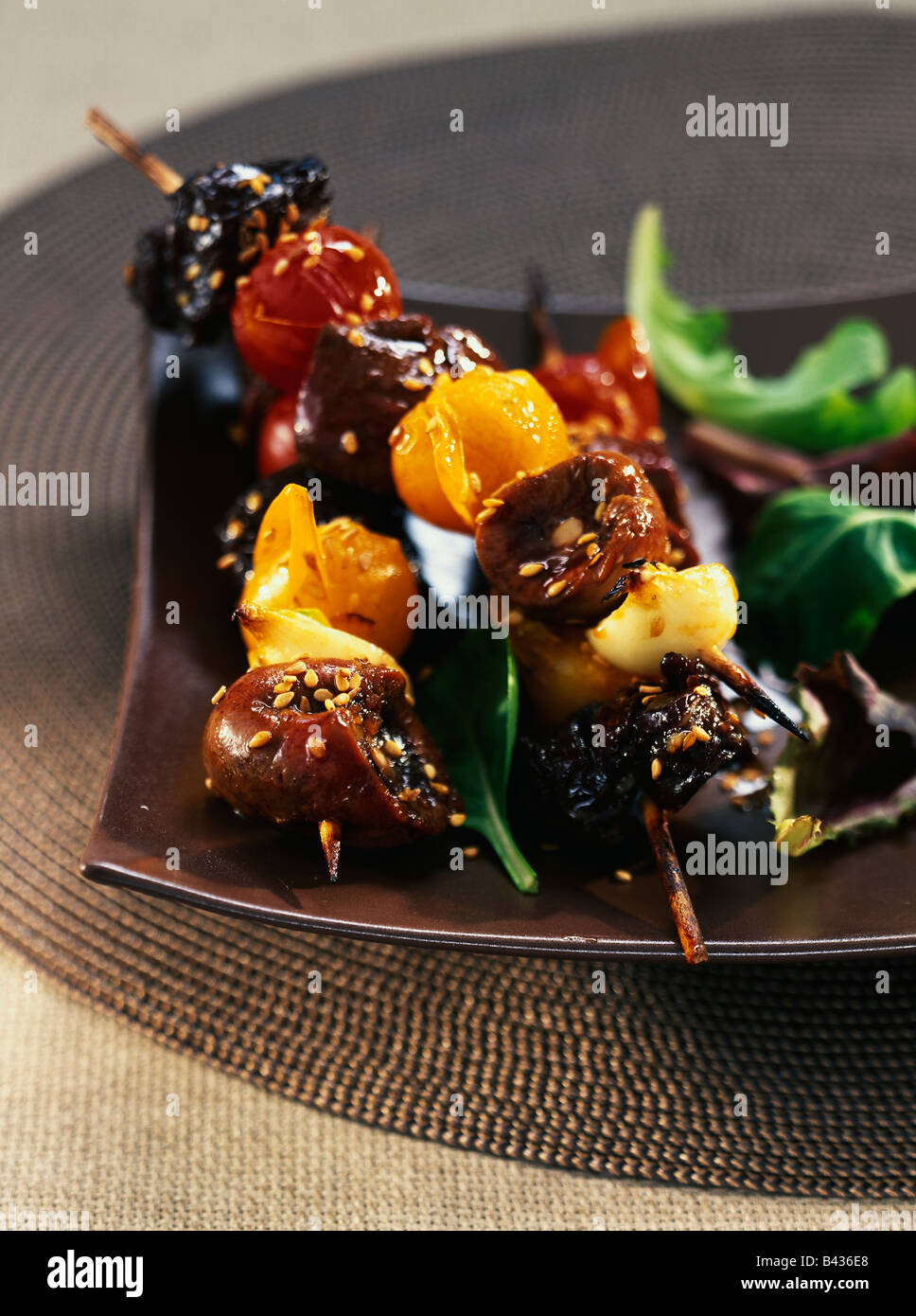 Kidney and vegetable brochettes Stock Photo - Alamy