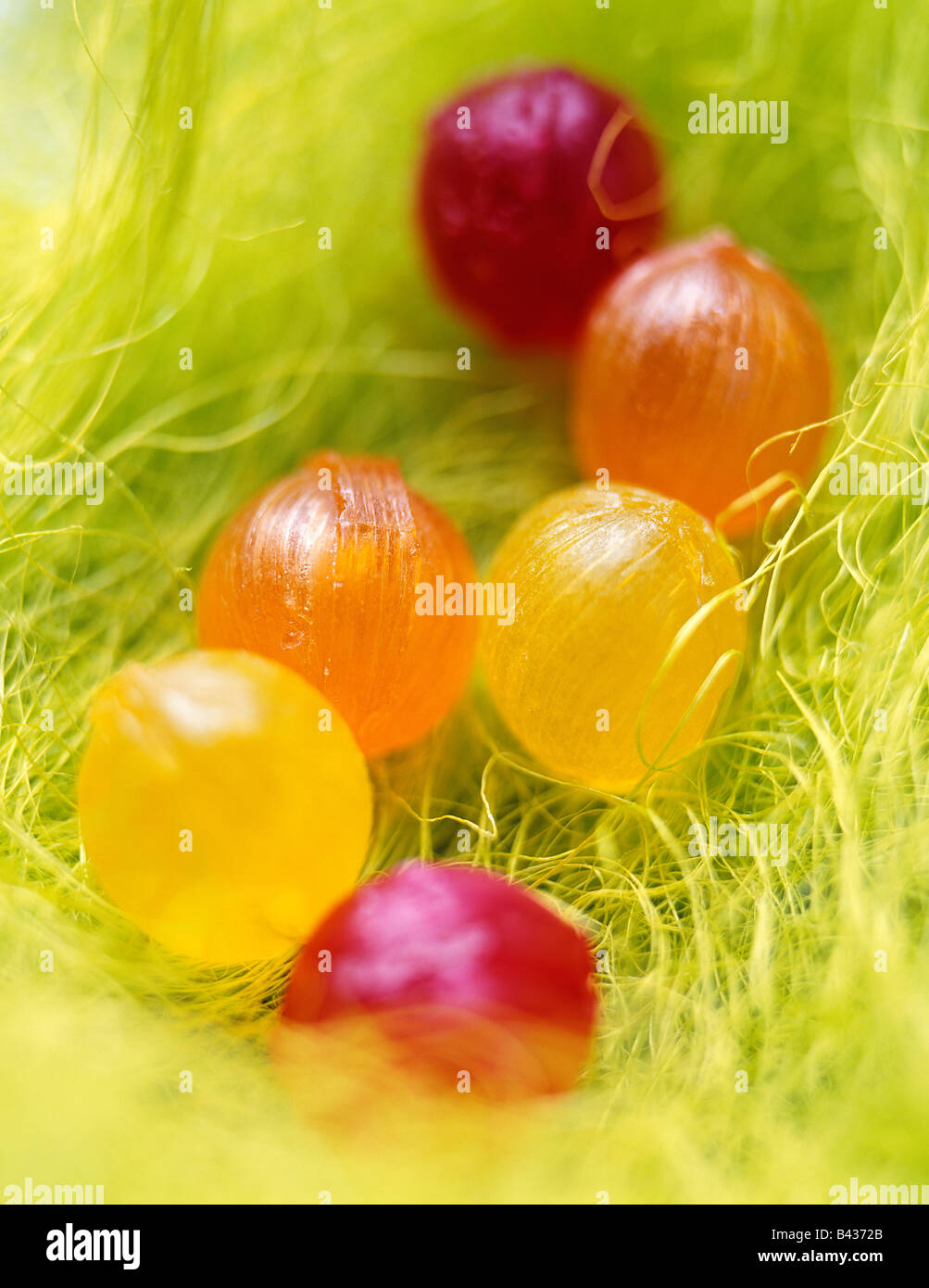 boiled candy in grass Stock Photo - Alamy