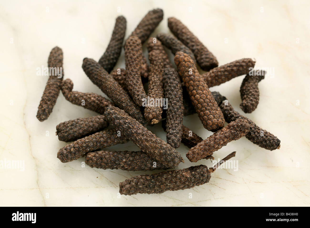 Long black pepper Stock Photo - Alamy