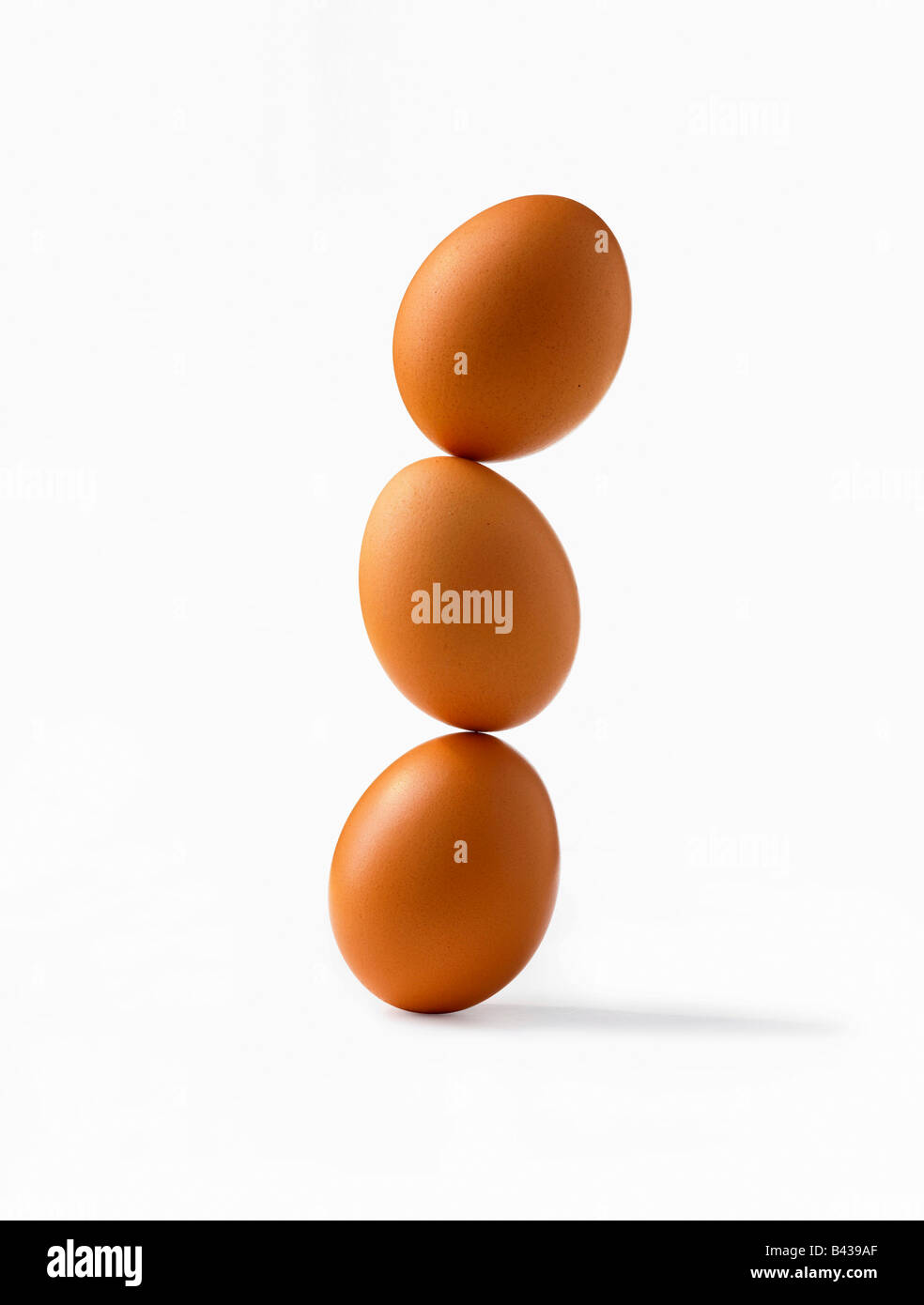 Balancing pile of eggs Stock Photo - Alamy