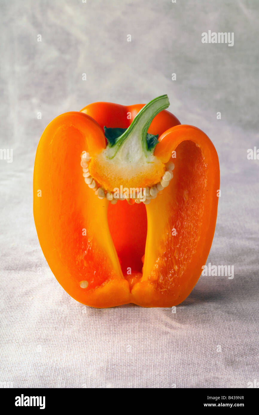 Half an orange pepper Stock Photo - Alamy