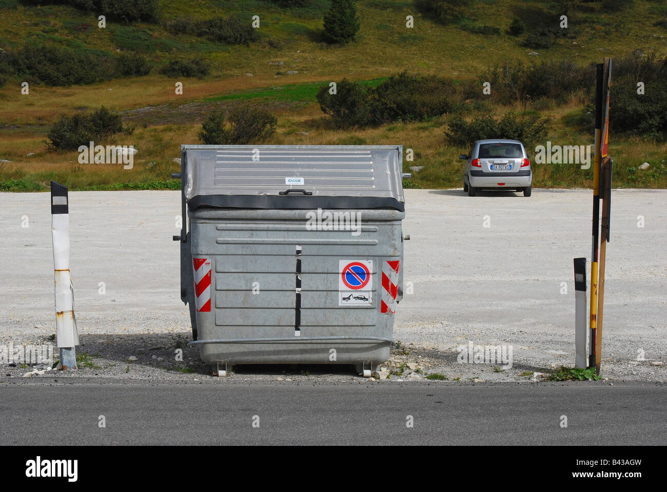 garbage container on the road side Italy Stock Photo - Alamy