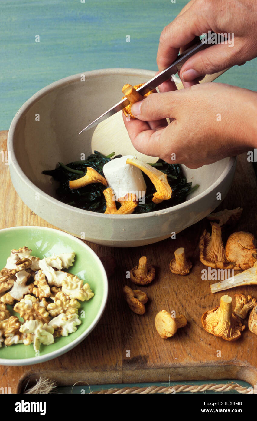 Cutting the mushrooms Stock Photo - Alamy